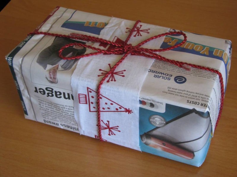 Using newspaper as gift wrap | Learning 4 Kids