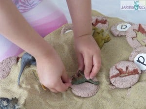 Digging for Dinosaur Fossils Sensory Bin | Learning 4 Kids