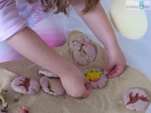 Digging for Dinosaur Fossils Sensory Bin | Learning 4 Kids